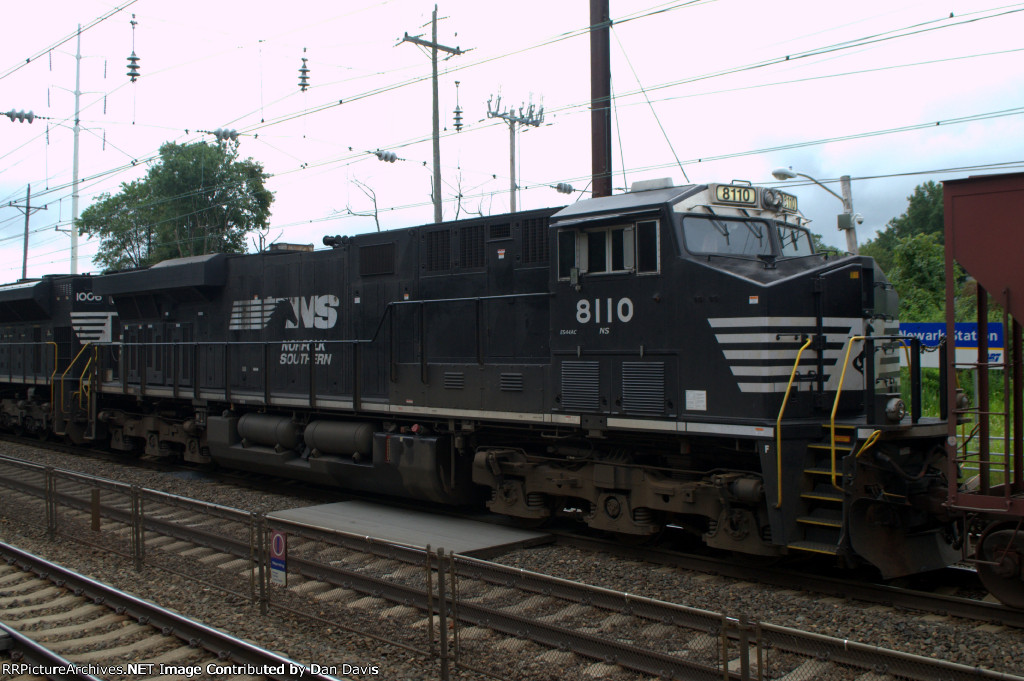 NS ES44AC 8110 trails on 64R
